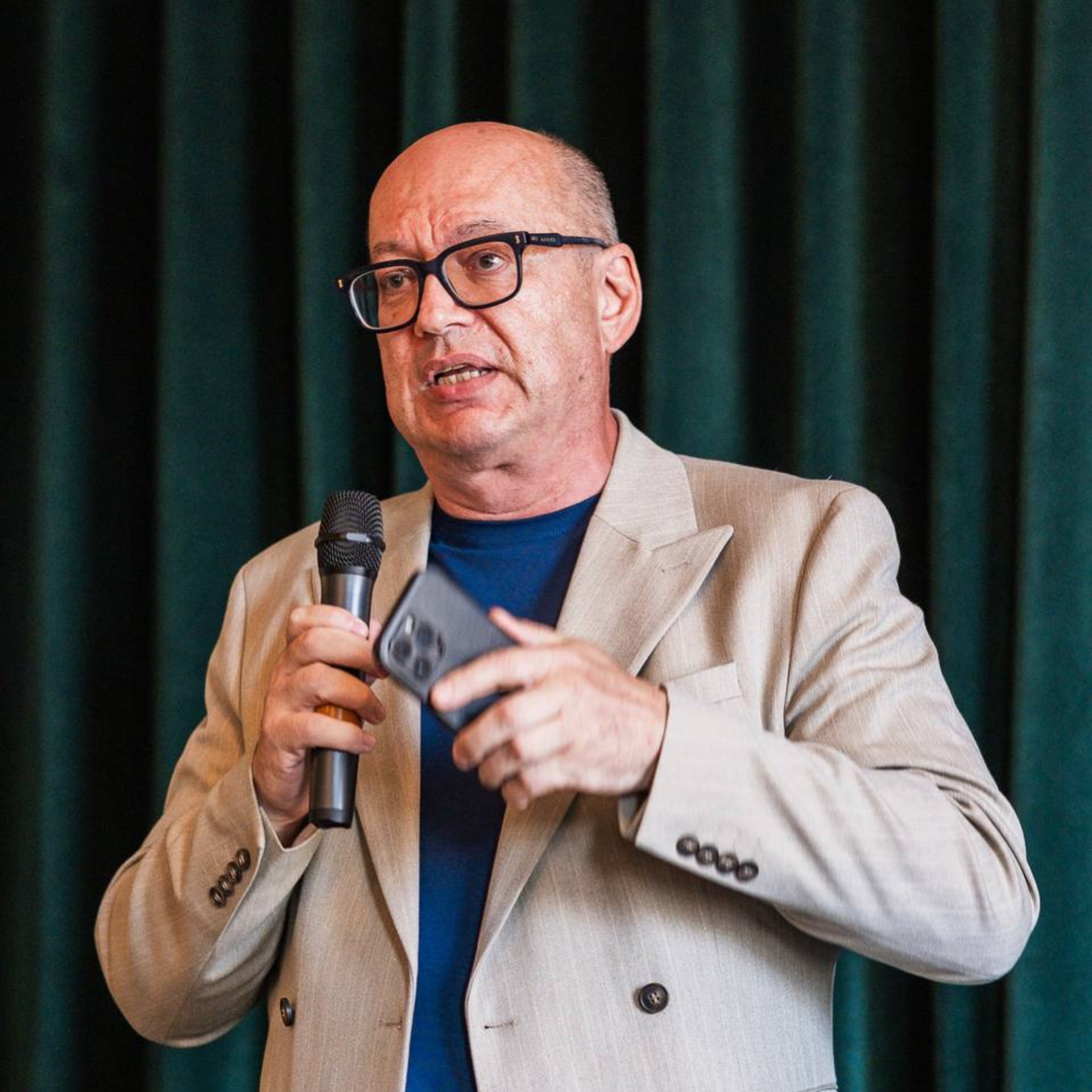 Иконка канала Деньги с Эриком Розенфельдом