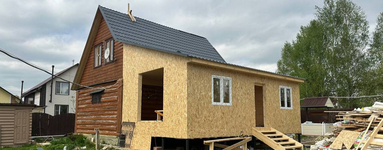 Пристройки к дому. Бригада строителей
