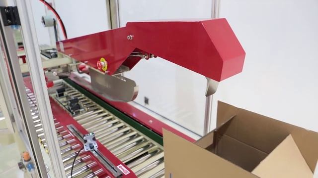 Полуавтоматический заклейщик коробов, модель AT5050.mp4