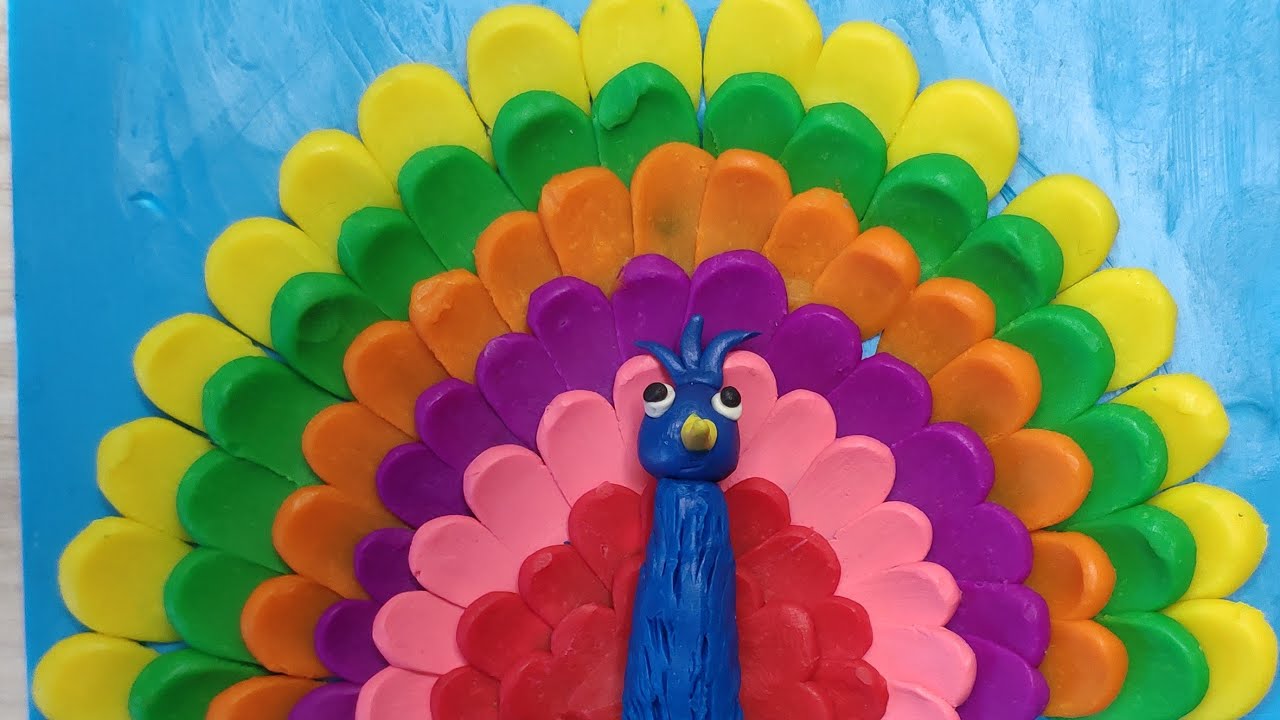 Аппликация из пластилина * ПАВЛИН*.