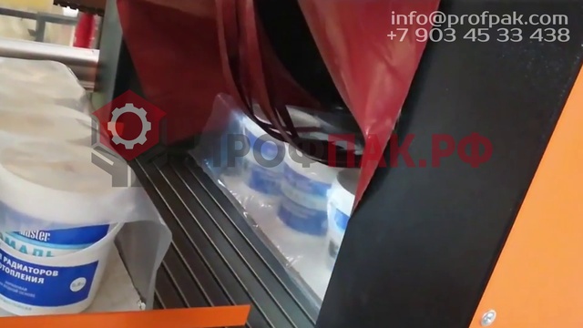 Групповая упаковка банок с краской полуавтоматической машиной ТМ-1П