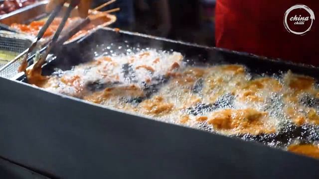 Chinese Street Food -Night market fried rice with eggs，egg ham moon bun  at  Food stall