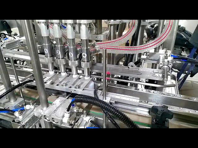 Автомат розлива по объему 4 головки (в наличии)- EtiKon.ru