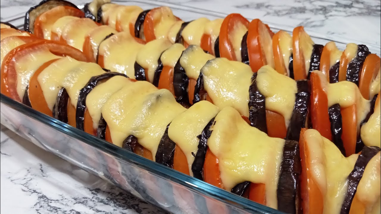 Баклажаны и помидоры под сыром в духовке