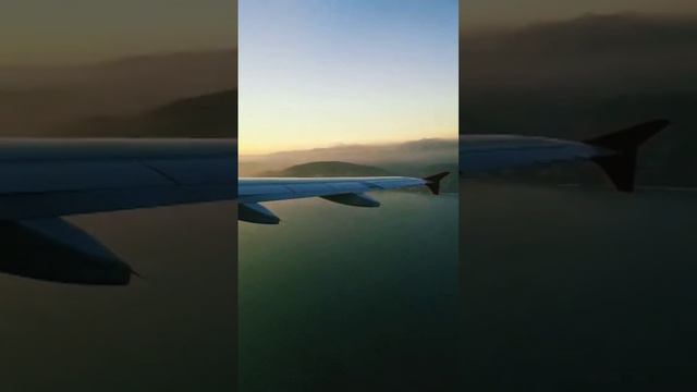 Вид из иллюминатора. Море. Горы. Александра Миркушова