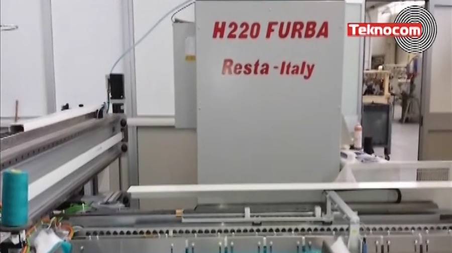 Стегальная машина на пяльцах