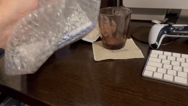 Распаковка диска Призрак Цусимы: Режиссёрская версия для PlayStation 5