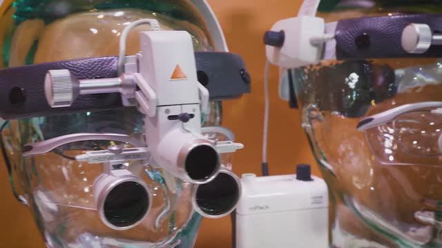 Бинокулярные лупы и налобные осветители HEINE Optotechnik