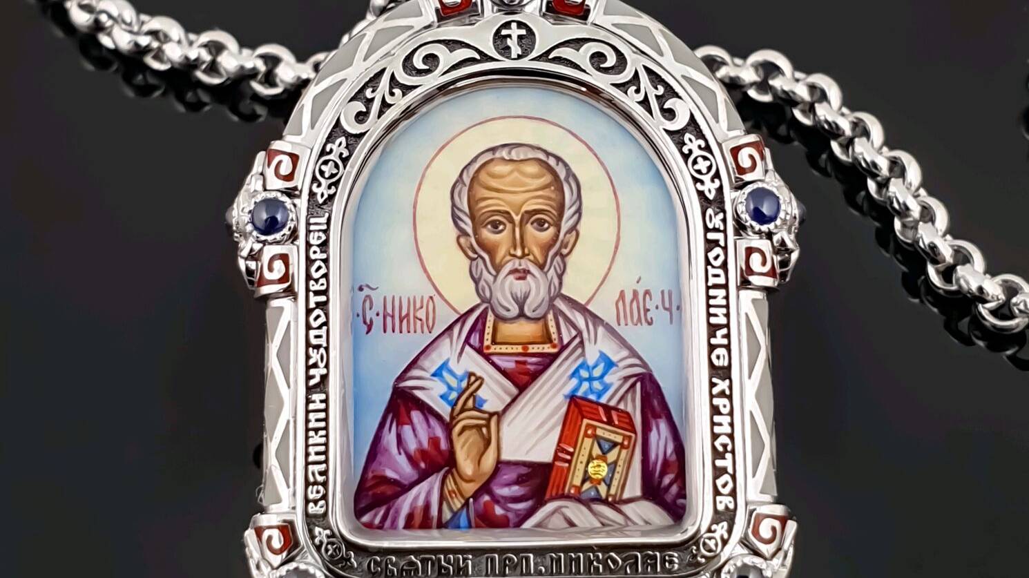 Нательная икона из белого золота с образами Николая Чудотворца и Ангела Хранителя