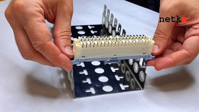 55882 Плинт ТК размык., ABS, 10 пар, медь, нумерация (1-0), бело-серый NETKO Optima