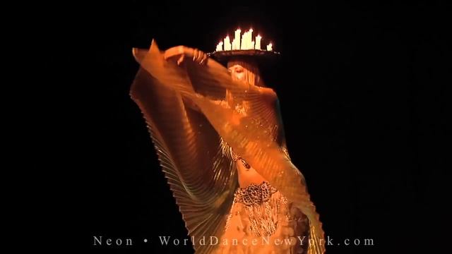 Can YOU do this? Amazing bellydancer Neon - candle tray + wings