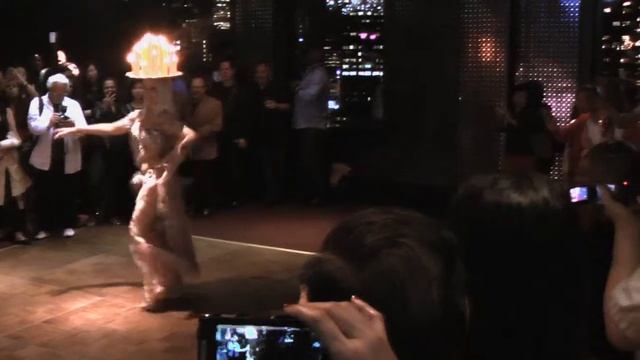 Neon belly dancing with a candle tray at 230 Fifth Ave. Empire Room, New York City - belly dance