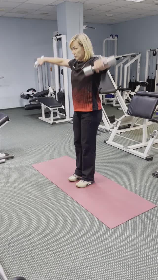 Разводка гантелей стоя в стороны