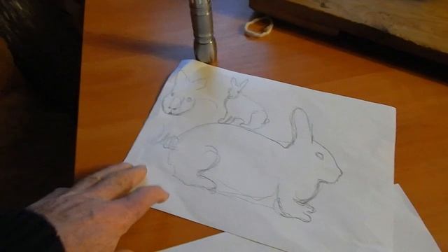 Кролик из снега на бумаге