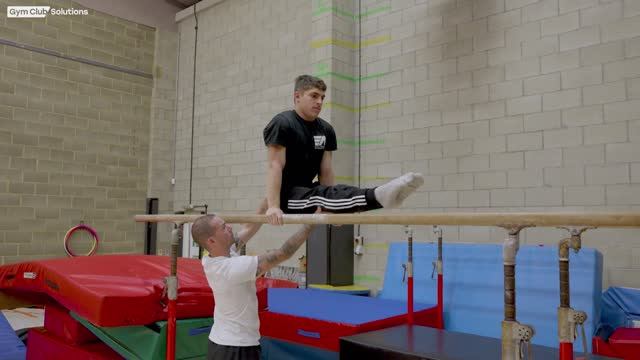 Обучение Спад - Подъем разгибом на брусьях