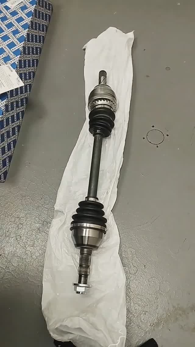 Приводной вал левый Опель Астра j