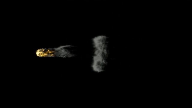 Rocket engine flame with gray smoke at launch on black background