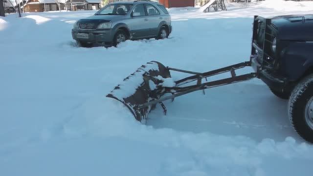 На УАЗе с отвалом.