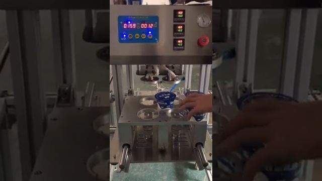 Автоматическая машина для запечатывания стаканчиков