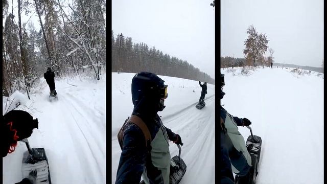 Мотосноуборд валит по глубокому снегу Казани