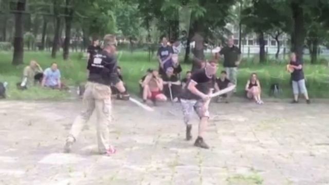 Machete fighting. Counterattack against a strike the hand.Armed Combat and Tactics.