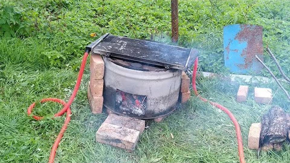Греем бассейн дровами - мега печка из бочки и автомобильного радиатора.
