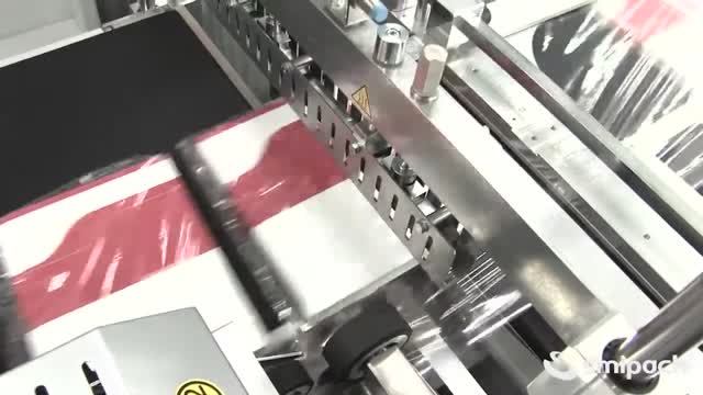 Упаковки книг в термоусадочну. пленку на автоматическоймашине Smipack HS500E+T452