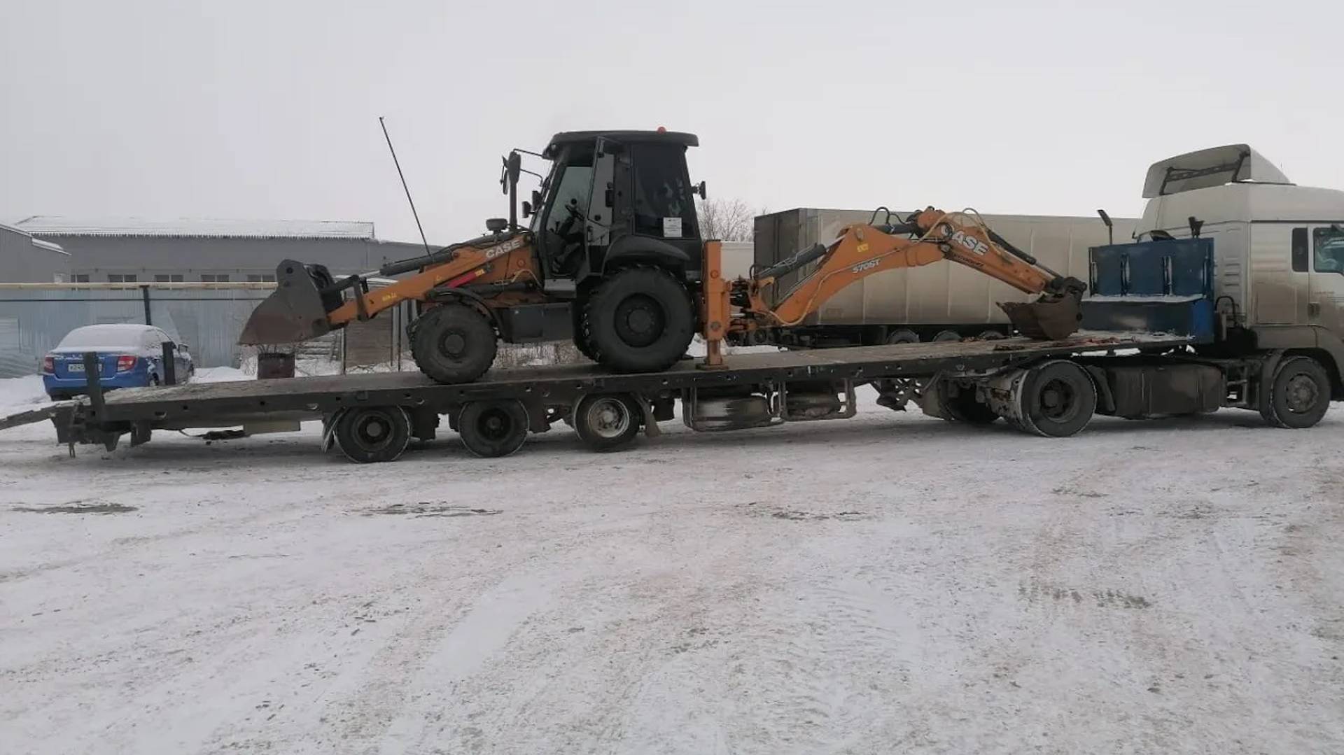 ПЕРЕВОЗКА ЭКСКАВАТОРА ПОГРУЗЧИКА НИЗКОРАМНЫМ ПОЛУПРИЦЕПОМ/ТРАКТОР ЗАЕЗЖАЕТ НА #ТРАЛ/ #ГРУЗОПЕРЕВОЗКИ