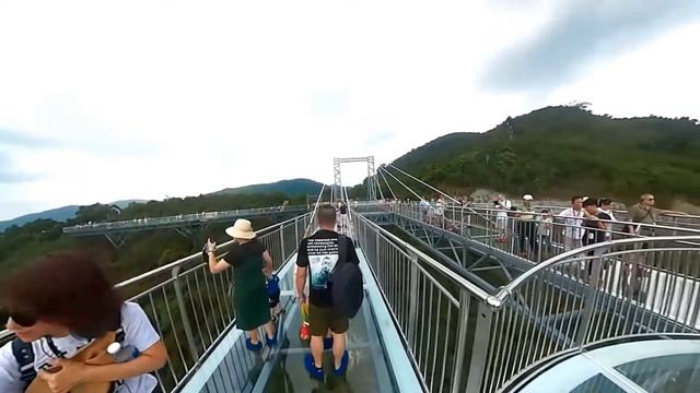 A walk on the glass bridge at Yanoda park, Hainan, China