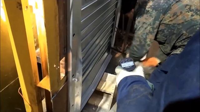 Испытания промышленных рулонных ворот из стального профиля М-80 на взломостойкость ГОСТ Р 52502-2012