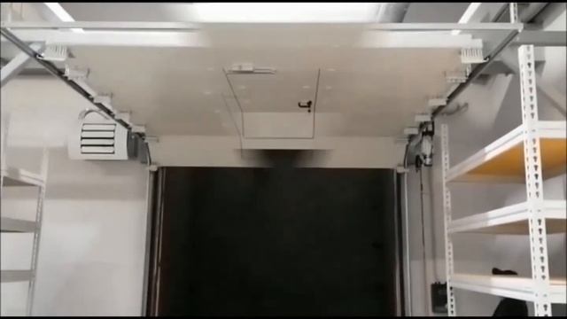 Секционные противопожарные ворота МВА (FireTechnics) EI60 на складе, подъем и опускание