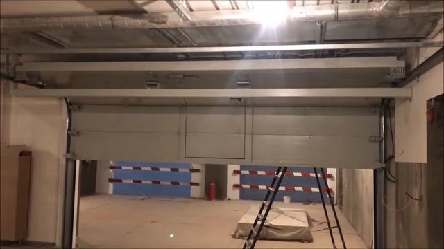 Секционные противопожарные ворота МВА EI60 на паркинге