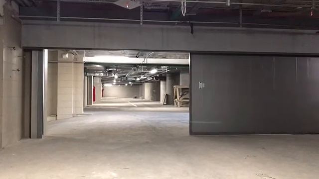 Дымозащитные шторы и откатные противопожарные ворота в системе противопожарной защиты паркинга