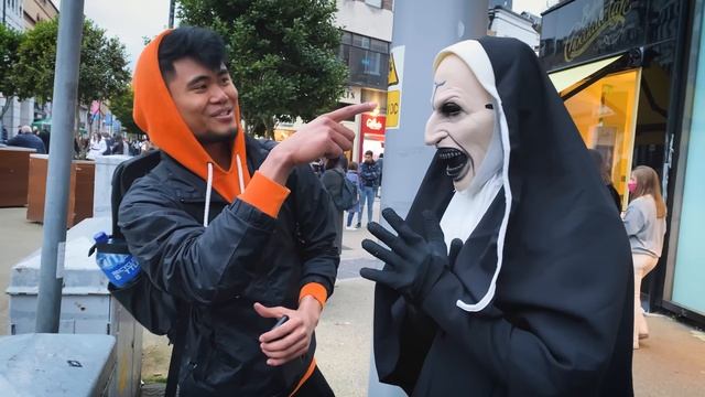 She has no Idea what's  behind Her. Craziest Reactions. The Nun Prank