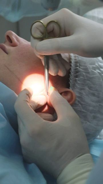 Хирургическое уменьшения мочки уха