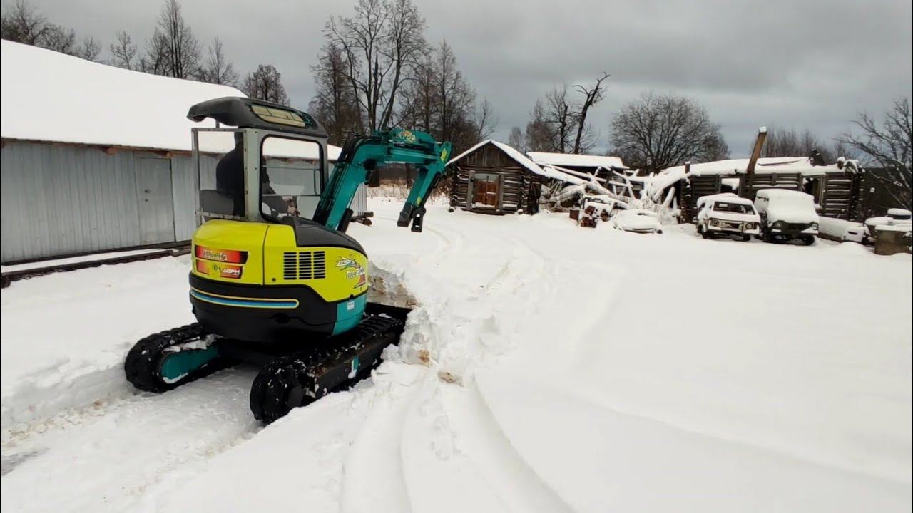 Уборка снега экскаватором