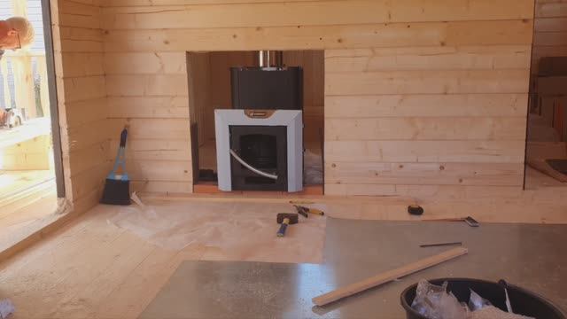 Заказ-Дом.рф - установка печи Ермак 16-ПС в баню с выносной топкой в предбанник и подготовка проема