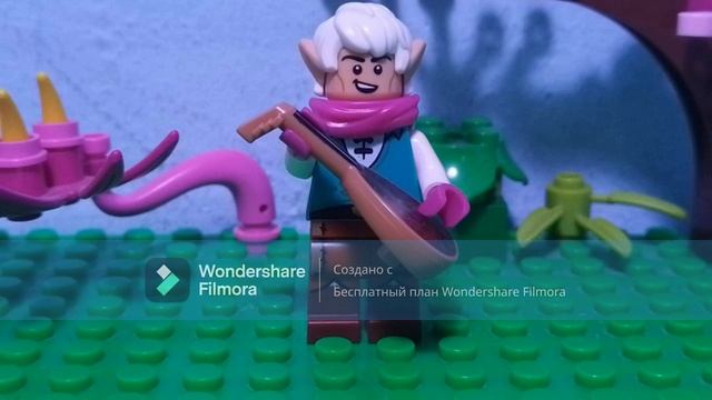 эльф играет на балалайке в лего.