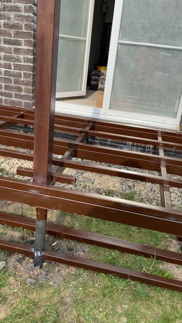 Терраса из ДПК Decline на свайном металлокаркасе.