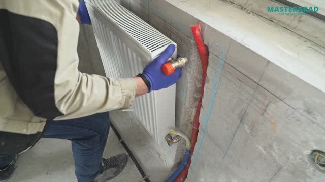Установка стального панельного радиатора с боковым подключением