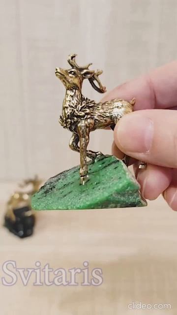 Svitaris   Цоизит с оленем : талисман гармонии и новых начинаний.