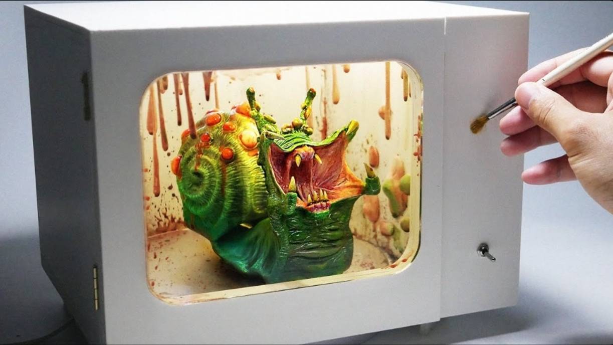 Улитка хищник в микроволновке из полимерной глины.