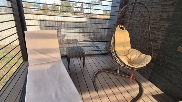 Обзор террасы с прозрачной крышей из прозрачными ралетам