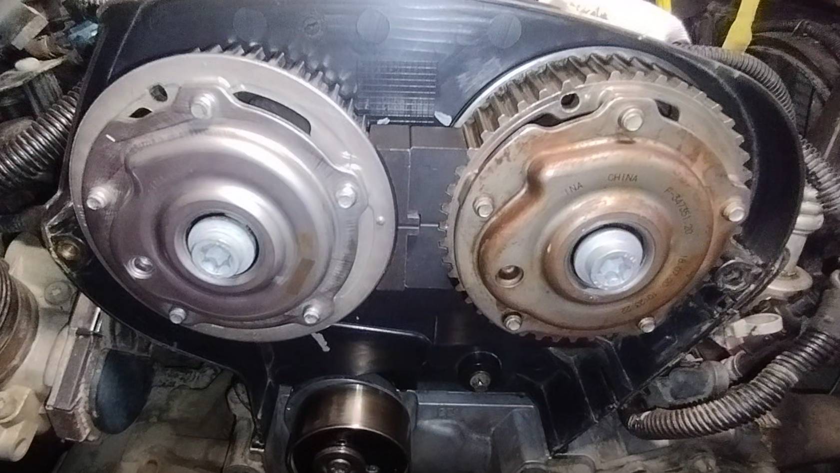 Впускной фазорегулятор и ремень грм Опель Астра J