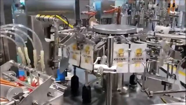 Автомат роторного типа для упаковки холодных кофейных напитков в готовый pouch пакет, doy-pack