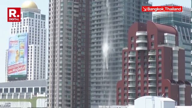Землетрясение в Бангкоке. Вода из бассейнов небоскребов расплескивается.