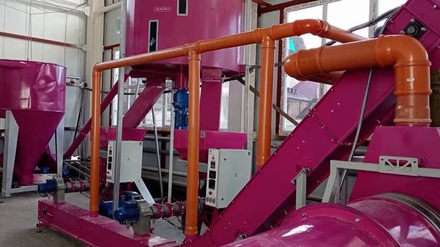 Line for extruding straw and grain