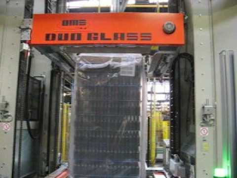 Упаковка стекла =бутылки в термоусадочную пленку на машине OMS AT530