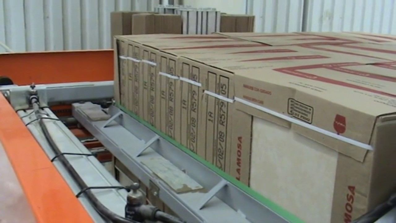 Решение по упаковке керамической плитки на паллете машина 06GS + АТ53