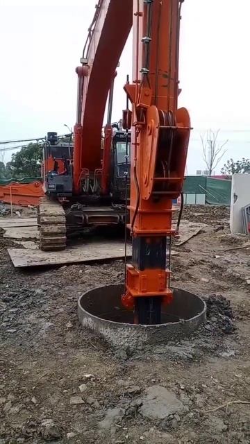 Телескопическая рукоять (стрела) с глубиной копания 22м с грейфером.